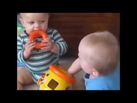 Twin baby girls fight over pacifier - YouTube