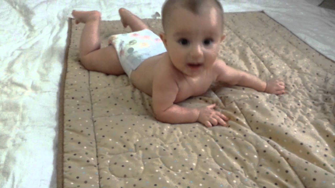 Baby learning to crawl - YouTube