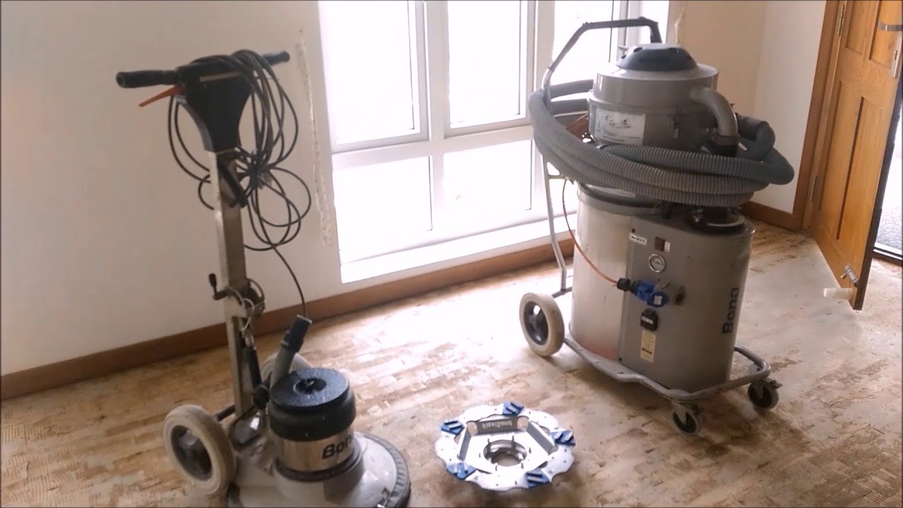 Grinding cement floor using Bona Diamond Disc attached with Bona ...