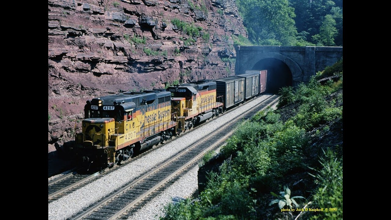 Chessie locomotives, and mid train helpers exit Sand Patch Tunnel in ...