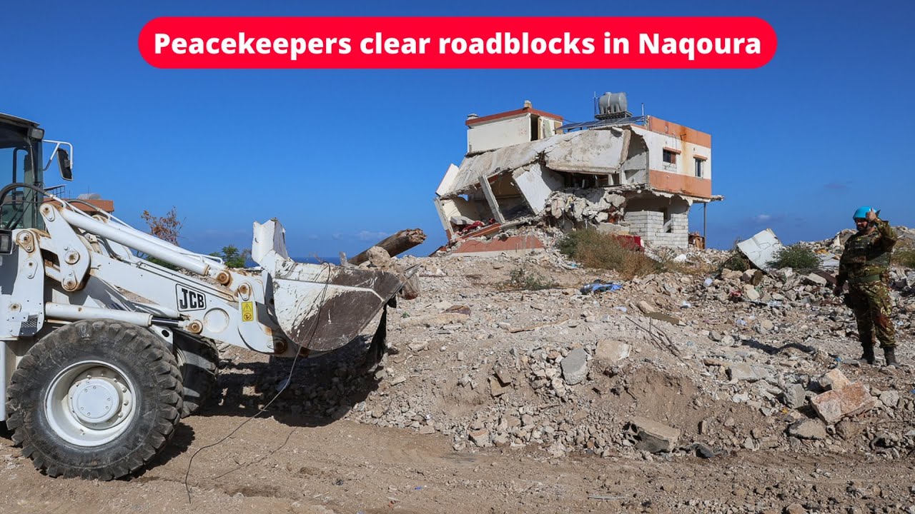 Peacekeepers clear roadblocks in Naqoura - YouTube