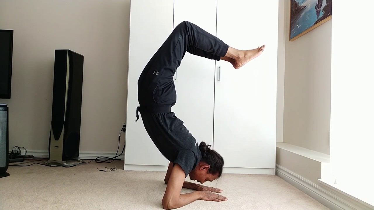 Vrischikasana (scorpion pose) - YouTube