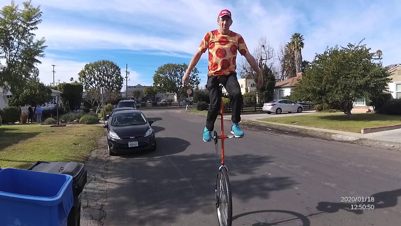 7 foot unicycle with a 36 inch wheel made by me! - YouTube