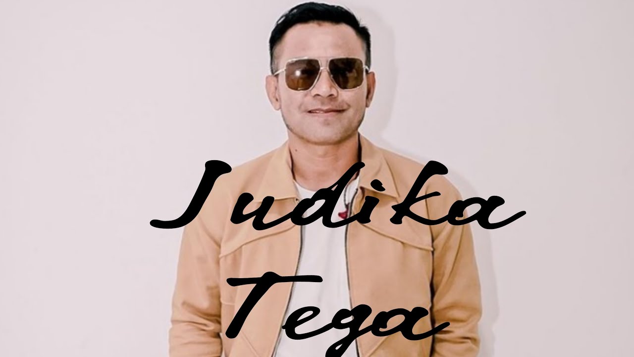 JUDIKA - Tega (Lyric Video) - YouTube