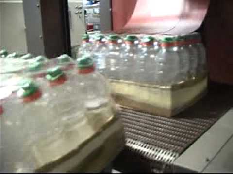 65TW BOTTLES IN TRAYS Shrink Wrap Packaging Machine - YouTube