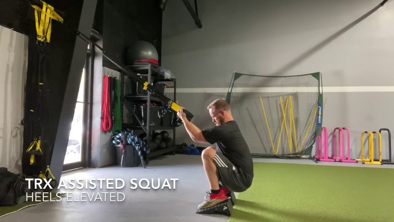 Heels Elevated Assisted Squat - TRX assistance for a deeper squat - YouTube