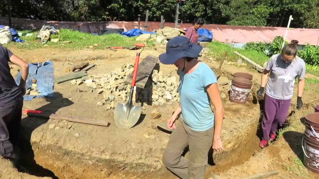 Rubble trench foundation for a Cob Building - YouTube