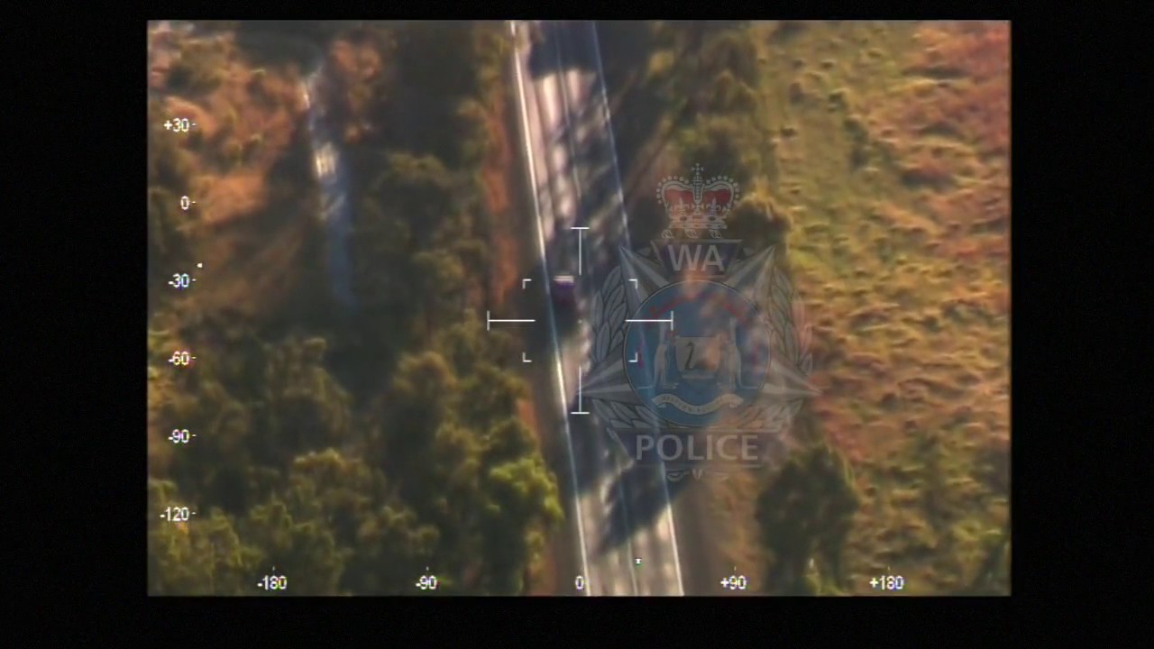 Police officer jumps out of helicopter to arrest teen car thief armed ...