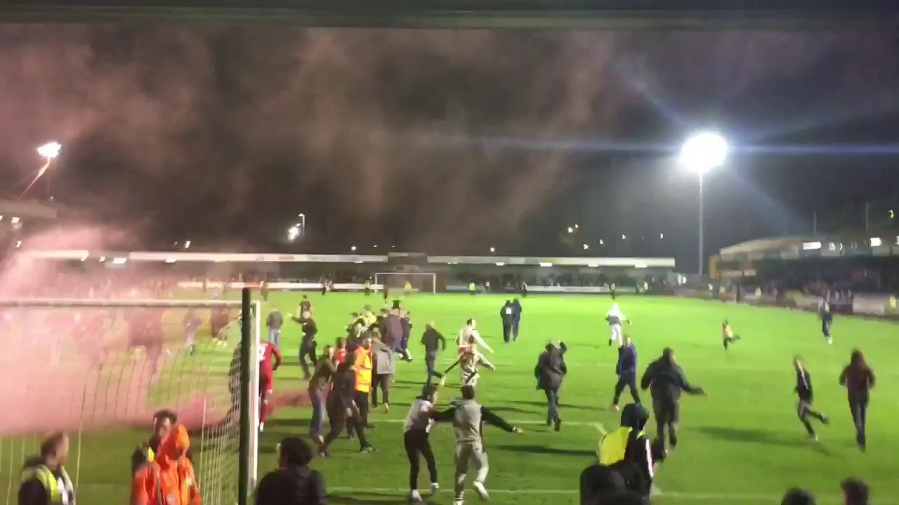 Crawley pitch invasion after beating Stoke on penalties - YouTube
