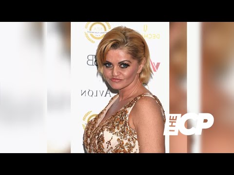 Danniella Westbrook tugs at teeny thong bikini