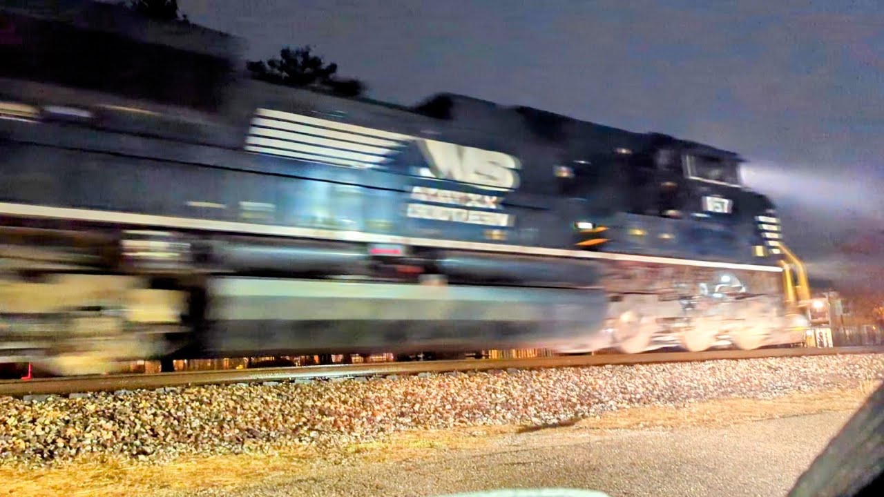 NS EMD running solo with a Northbound empty covered hoppers train on track two - YouTube