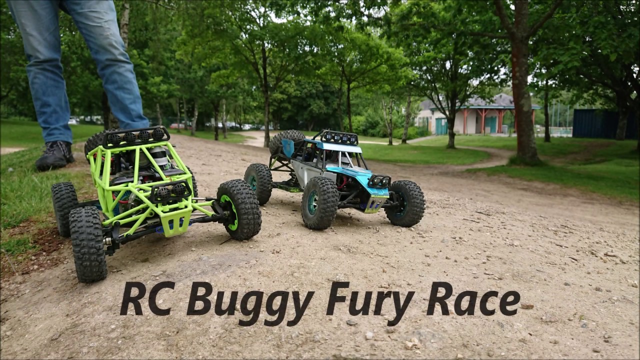 rc Buggy Fury Race WL toys battle - YouTube