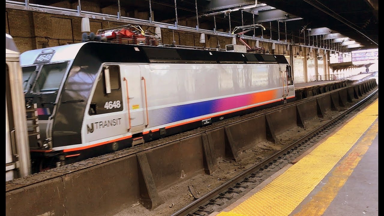 NJ TRANSIT A commuter service with a bi-level rake at Newark Penn ...