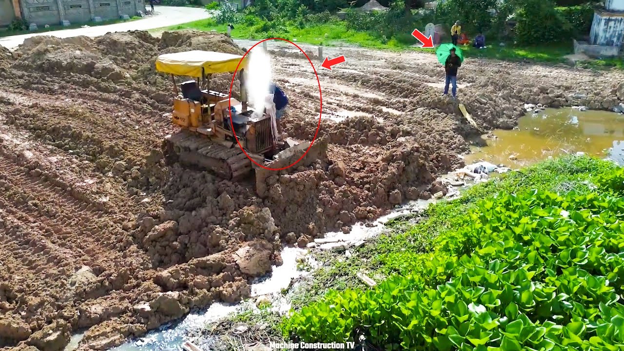 Incredible Action Driver Dozer showing skill Moving soil into water ...