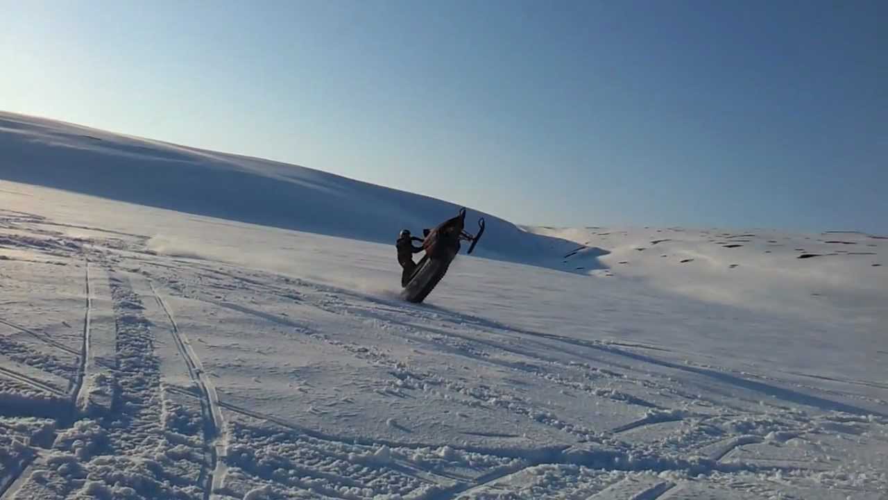 2011 crossfire 800ho snopro wheelie on flat ground - YouTube