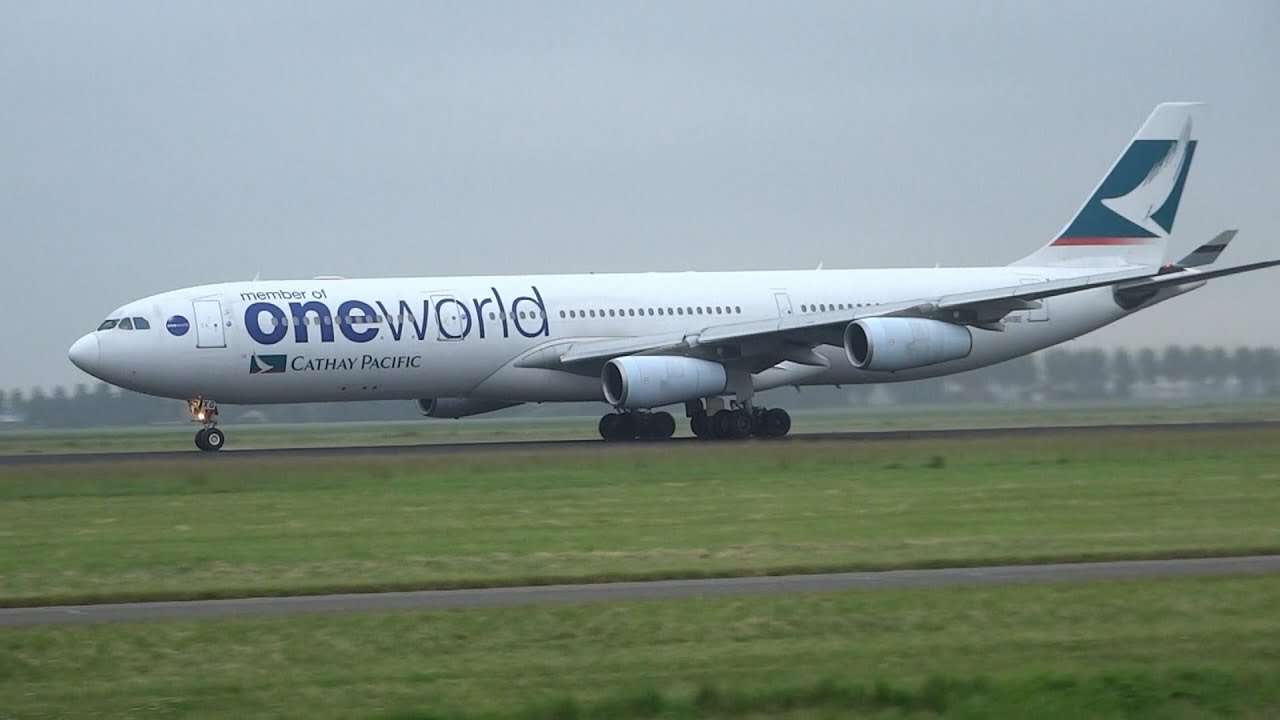 Cathay Pacific {One World Livery} Taking Off From The Polderbaan - YouTube