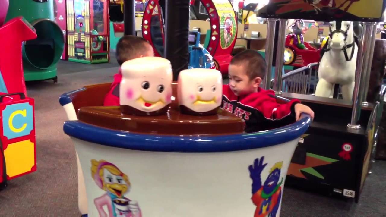 The boys riding tea cup ride - YouTube