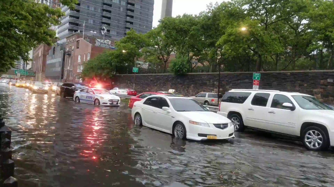NYPD Passing By On A Flooded Out FDR Drive In Manhattan, New York ...