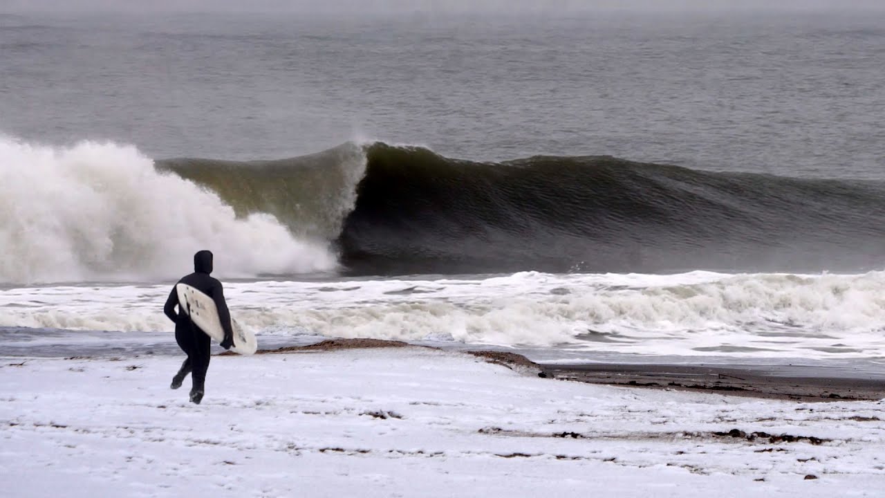 First Time Surfing w/ Snow on the Beach! - YouTube