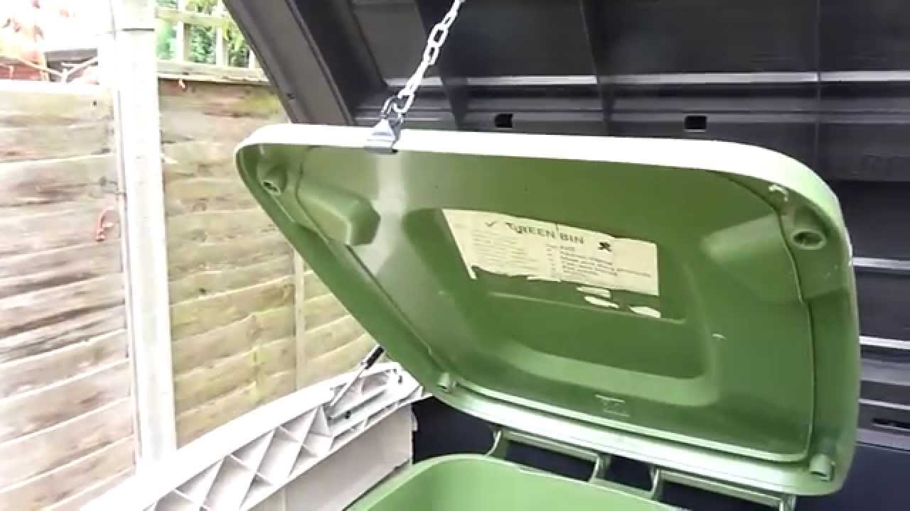 Blooma garden storage unit opened to show access to green bin - YouTube