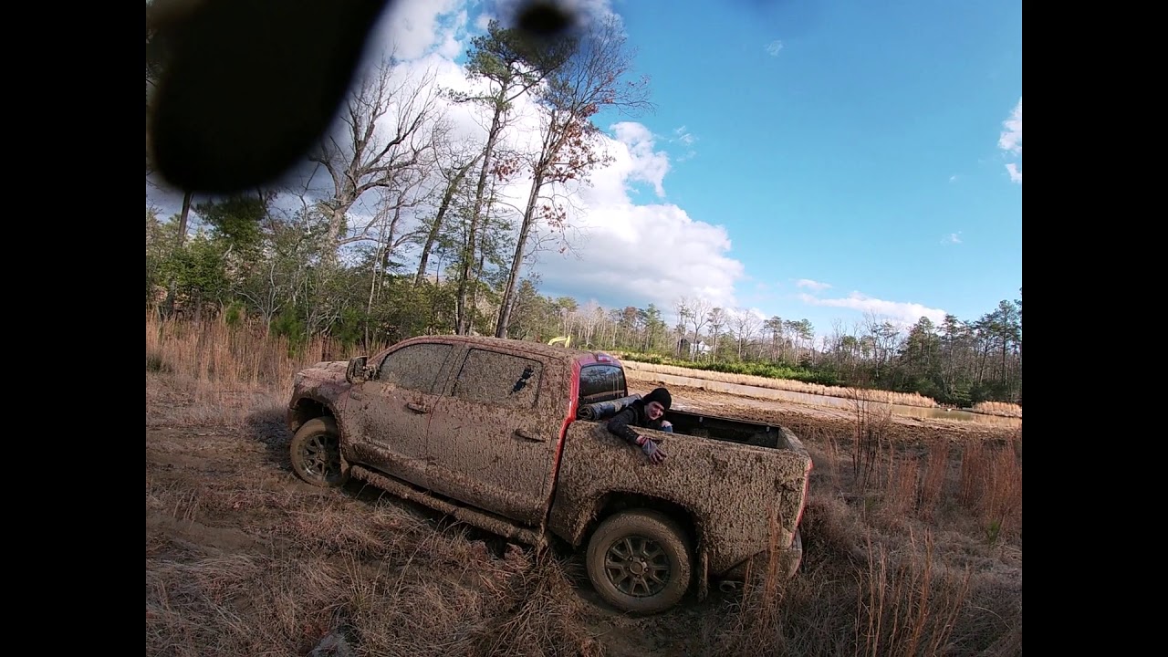 Playing In the Mud With Stock Toyota Tundra - YouTube