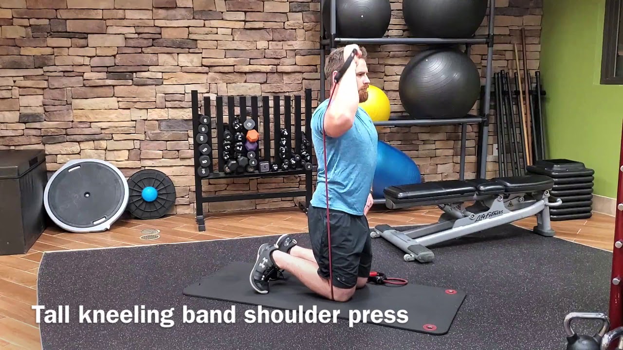 Tall kneeling band one arm shoulder press - YouTube
