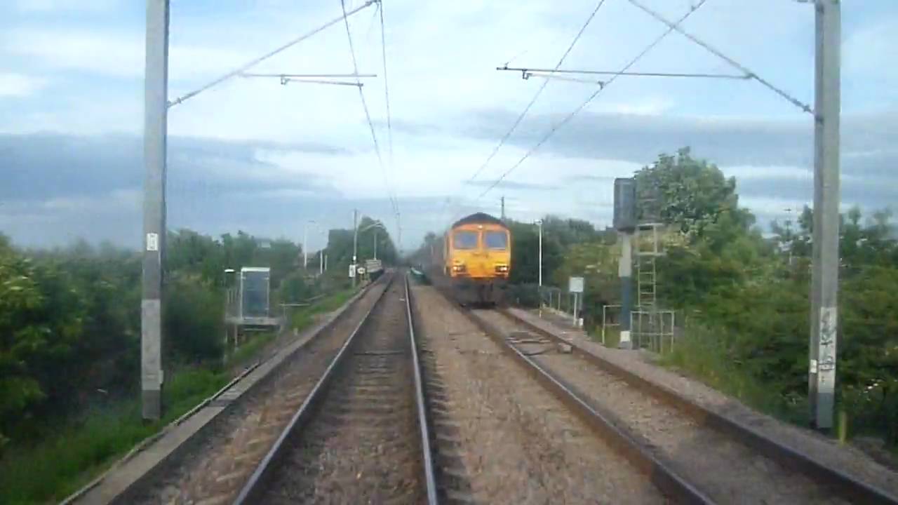 Class 599 passing GBRF class 66 (Cab View) - YouTube