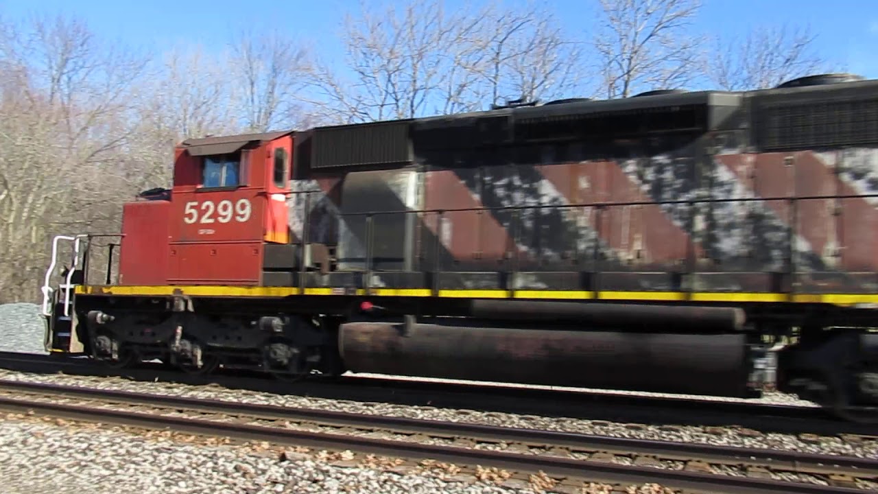 CN 5299 speeds East with a local freight train through Vicksburg, MI ...