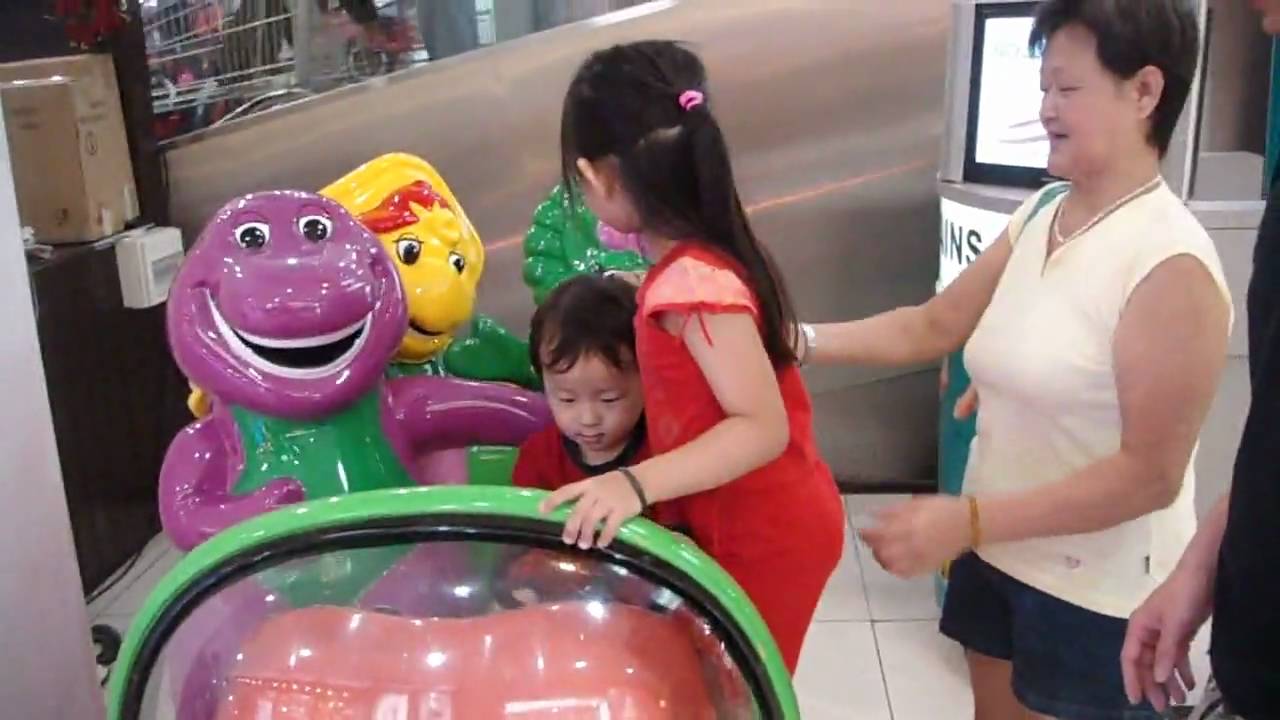 Samuel & Jingwen - on barney car ride - YouTube