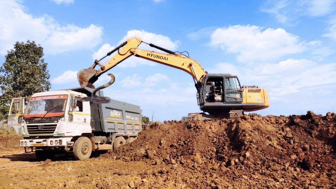 Jcb hyundai Excavator loading in mud Tata 3118 truck ll jcb excavator ...