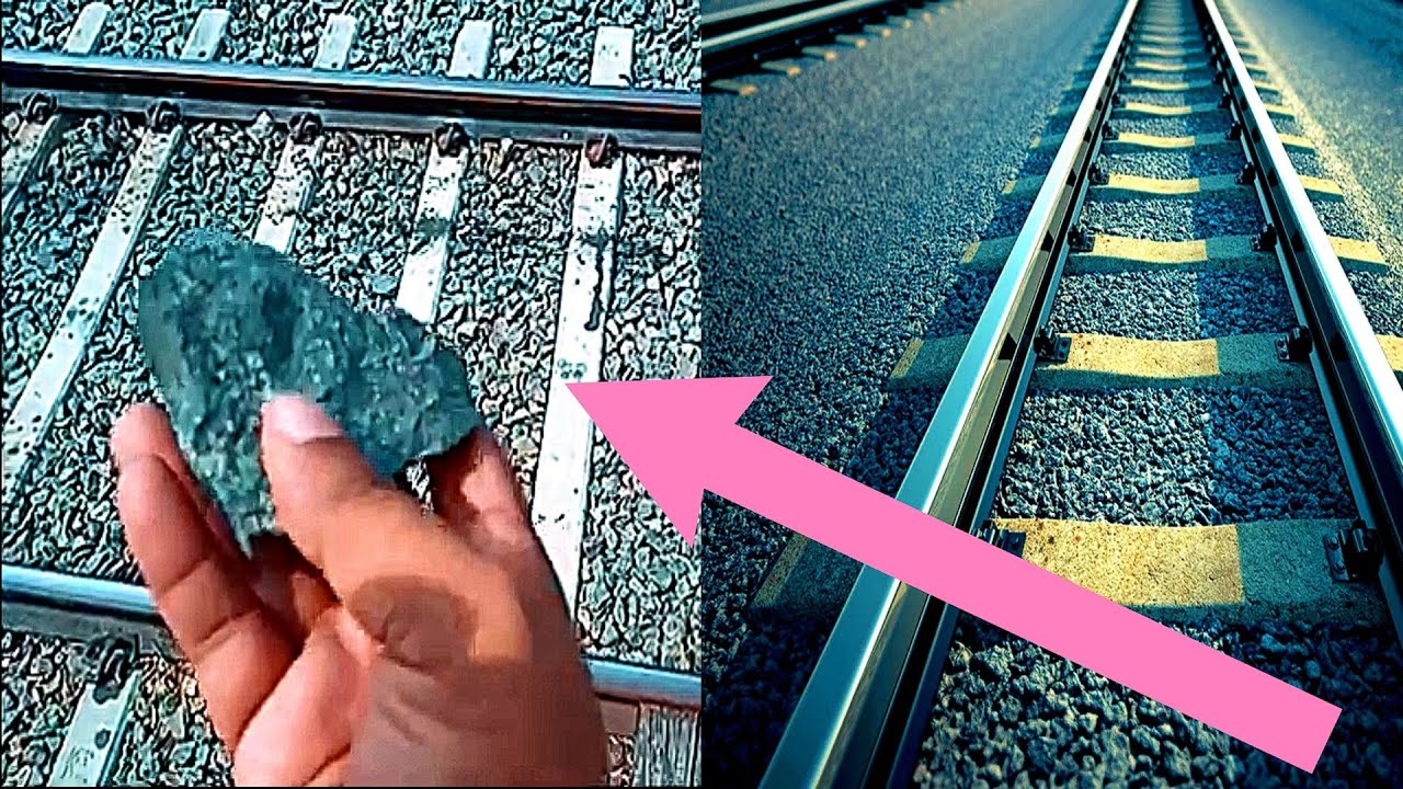 Why are there pebbles between the train tracks? - YouTube