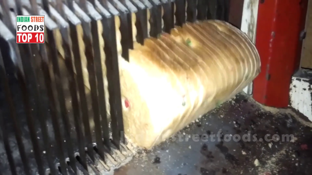 Bread Cutting and Packing In Bakery Using Bread Cutting Machine or ...