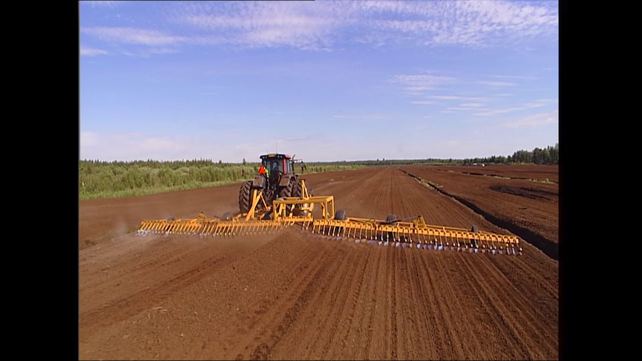 Milled Peat Harrower MPH-18 MH working on peat field - YouTube