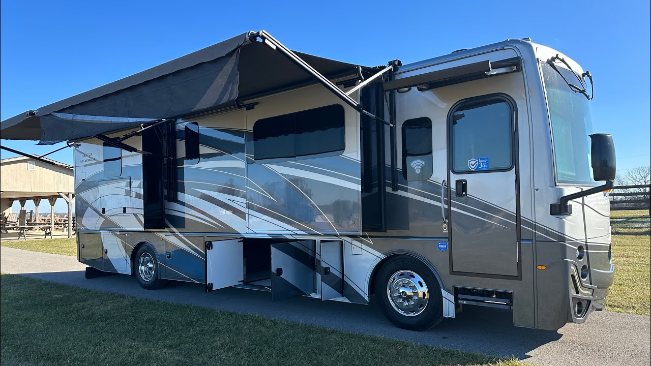 Class A diesel pusher with a Rear Owners Master Suite 2021 Holiday ...