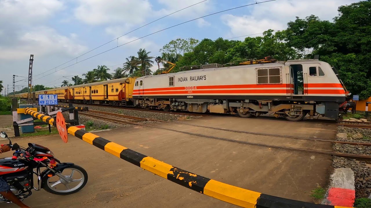 Balurghat express crosses like bullet speed between the rail gate | the ...