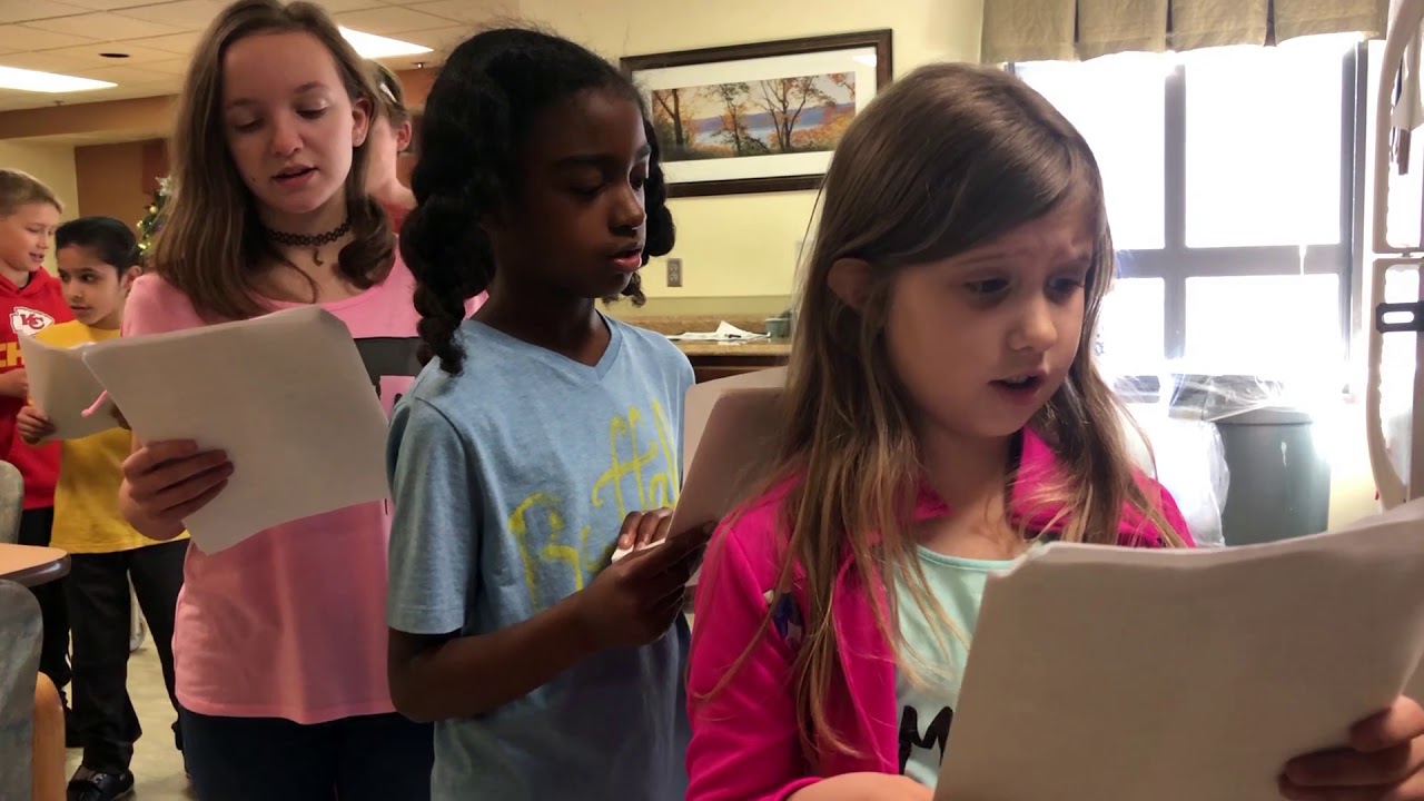 Luff Elementary Students Carol at The Groves Retirement Community - YouTube