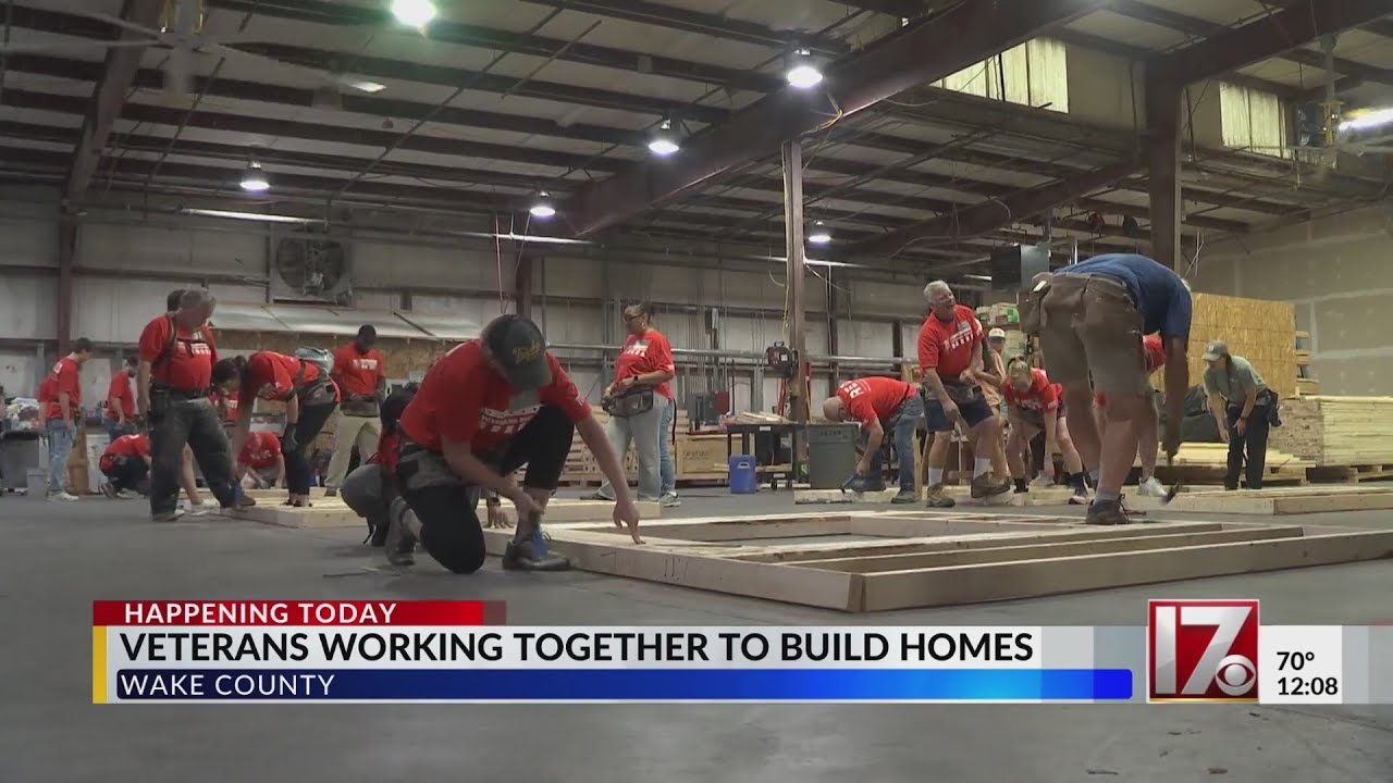 Veterans working together to build homes - YouTube