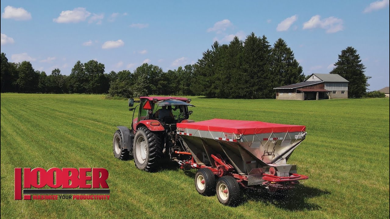 Walker Farms Of NJ Heartland AG-500 Spreader With Case IH MAX115 - YouTube