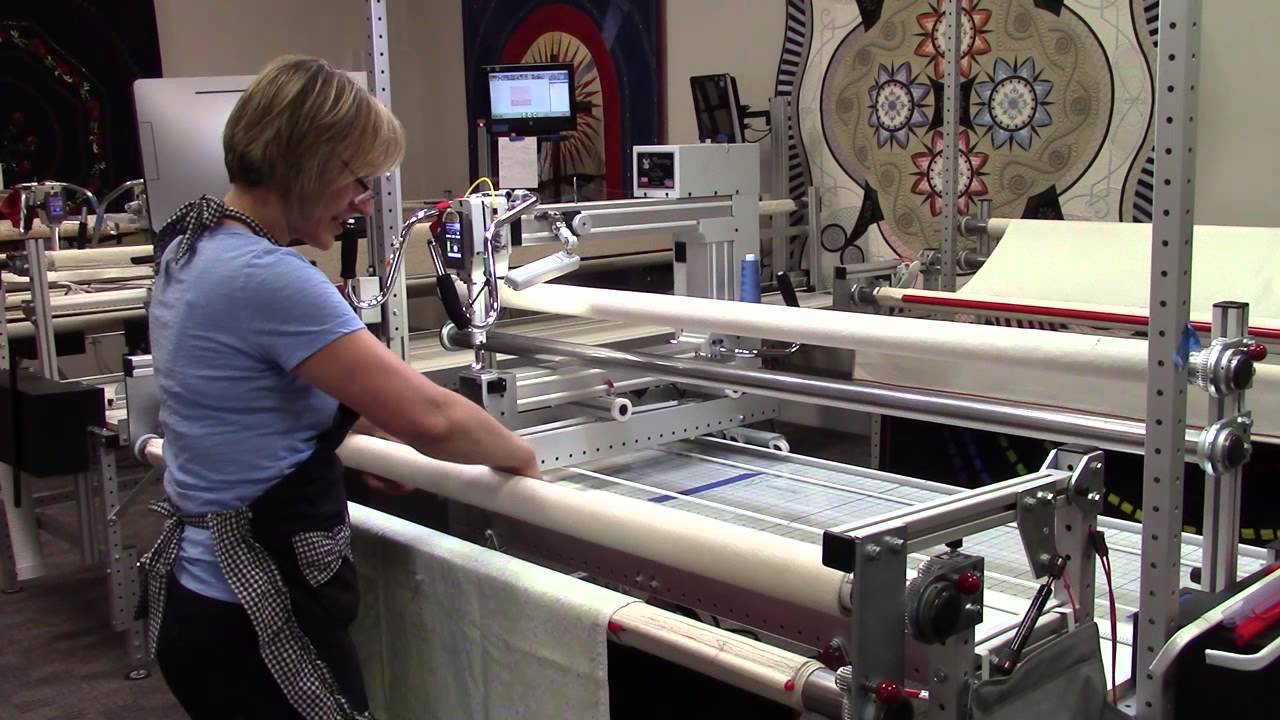 Loading A Quilt On the INNOVA Longarm Quilting Frame - YouTube