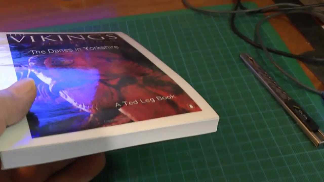 Bookbinding softbound books - YouTube
