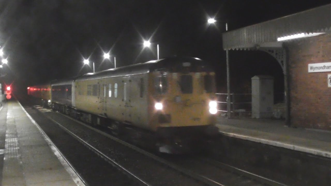 DBSO 9701 TnT 37057 on Norwich - Derby seen passing Wymondham 14/02 ...