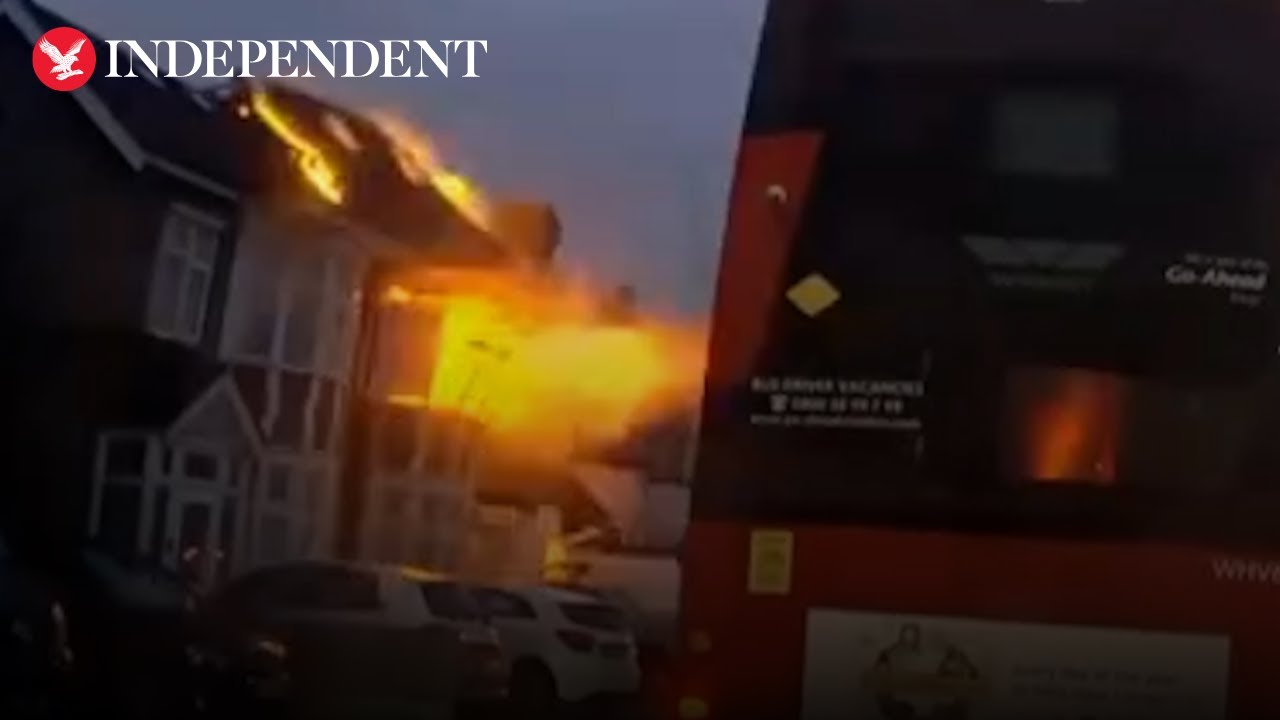 Moment house explodes metres away from bus - YouTube