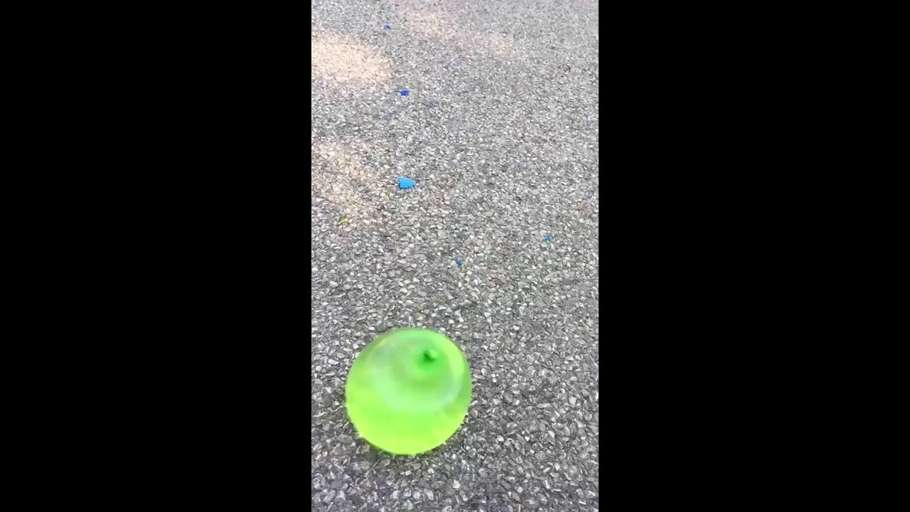 Slow motion water balloon drop - YouTube