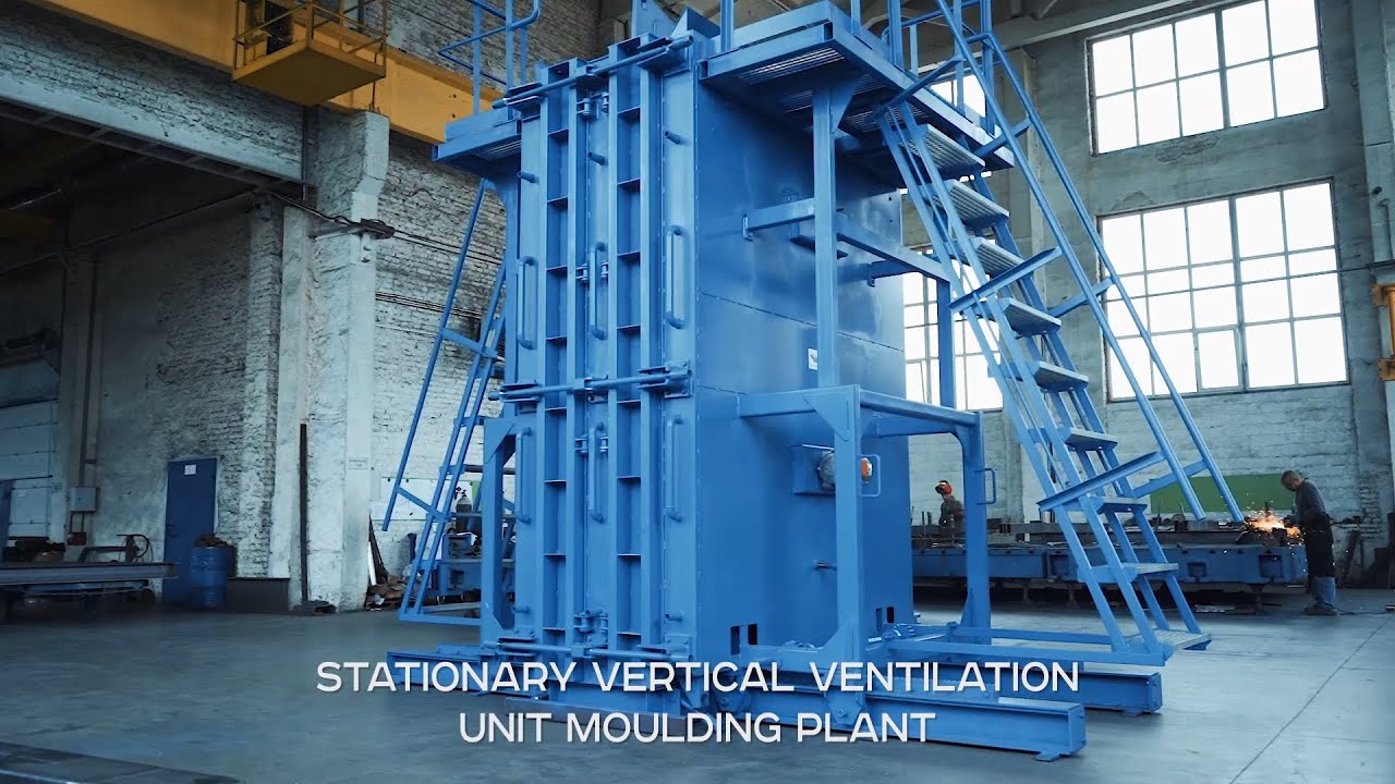 Vertical equipment with heating system and vibrators for the moulding ...