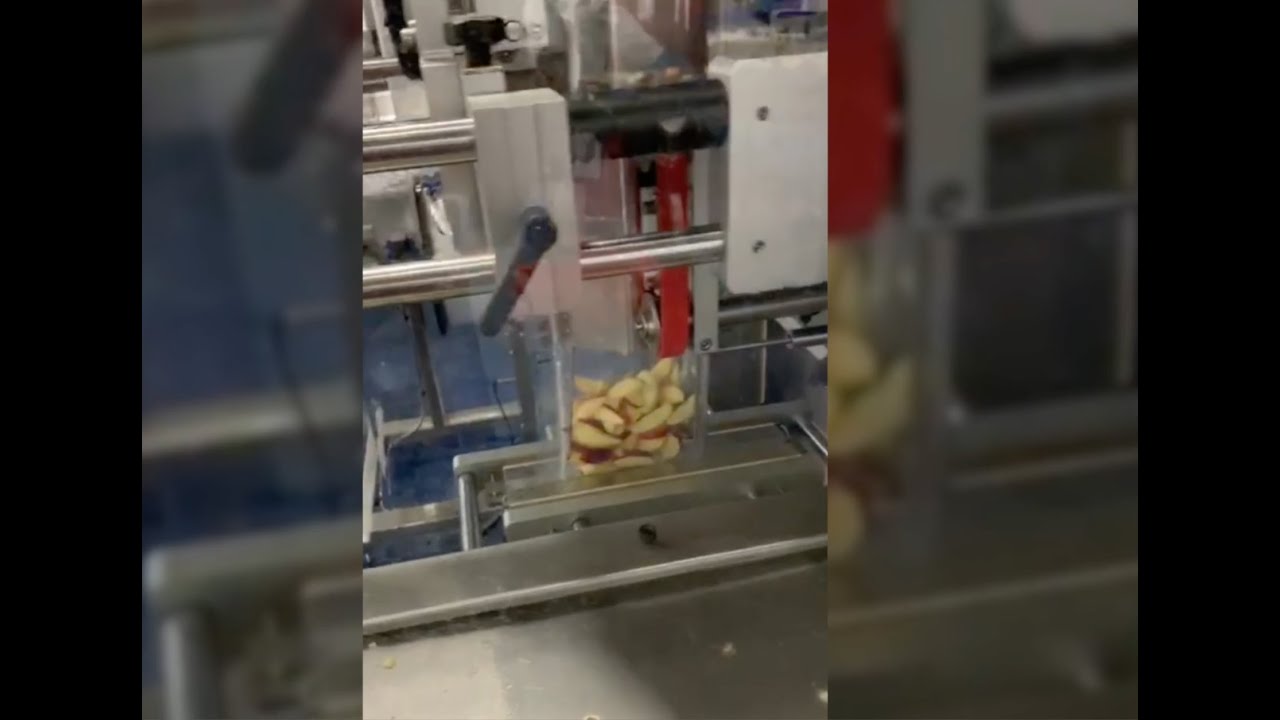 Bagging fruit in a Doy style stand up pouch on a LE360 PDQ - YouTube