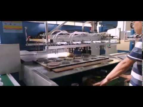 Plastic cover cutting machine with robot - YouTube