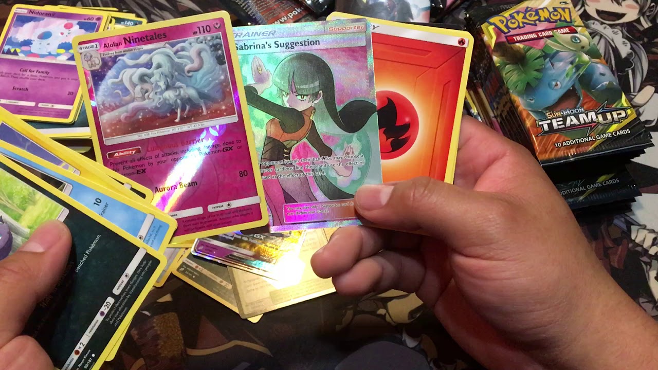 Opening 30 packs of the latest Pokémon Sun&Moon Tag Team - YouTube