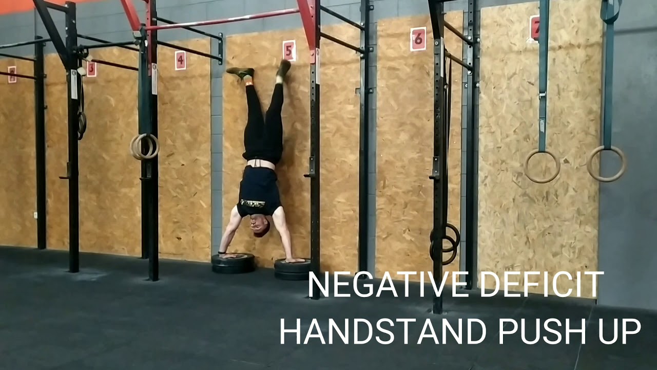 Negative deficit hand stand push up - YouTube