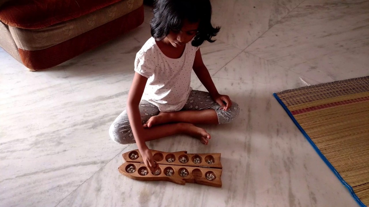 How to play Pallanguzhi - YouTube