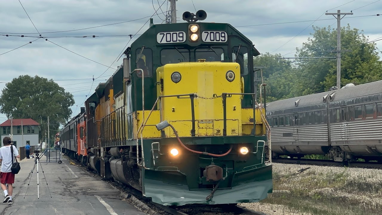 CNW 7009 SD50 leads The Illinois Railway Museum Coach train and CNW ...